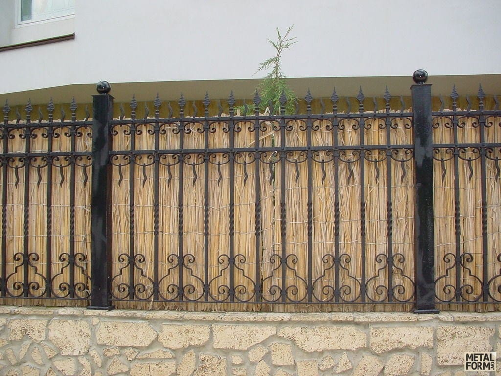 Romanesque wrought iron fence