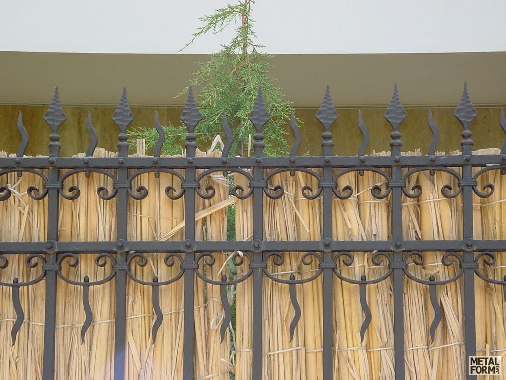 Romanesque wrought iron fence